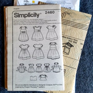 Simplicity 2460 Complete Uncut Factory Folds Project Runway Child's Knee Length Fit and Flare ...