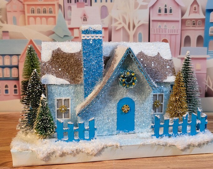Putz Glitter House in Blue With Chimney and Swooped Roof, Miniature Trees and Fence in a Snowy ...