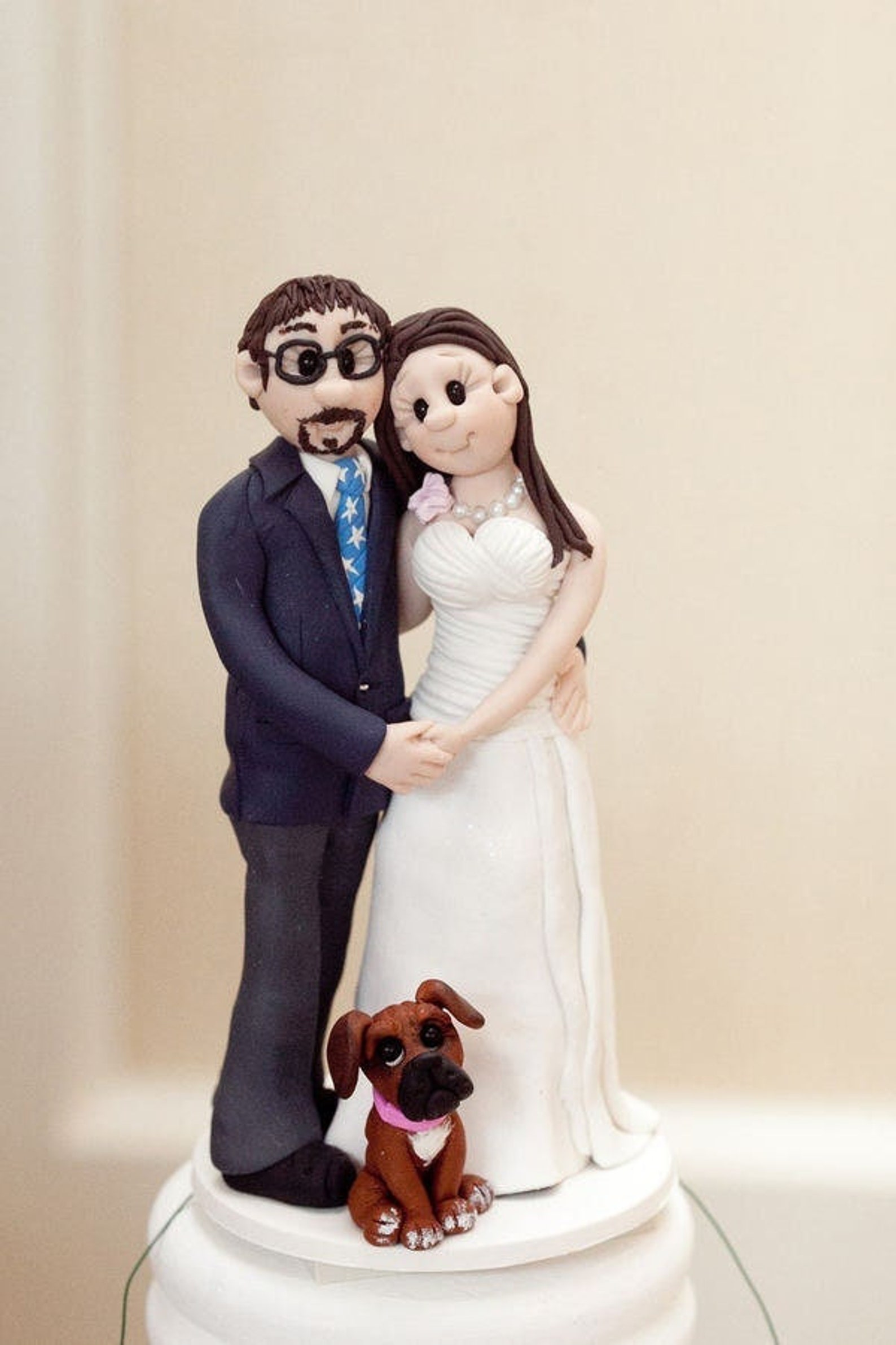 Bride and Groom Holding Hands With Pug Wearing a Bandana Wedding Cake ...