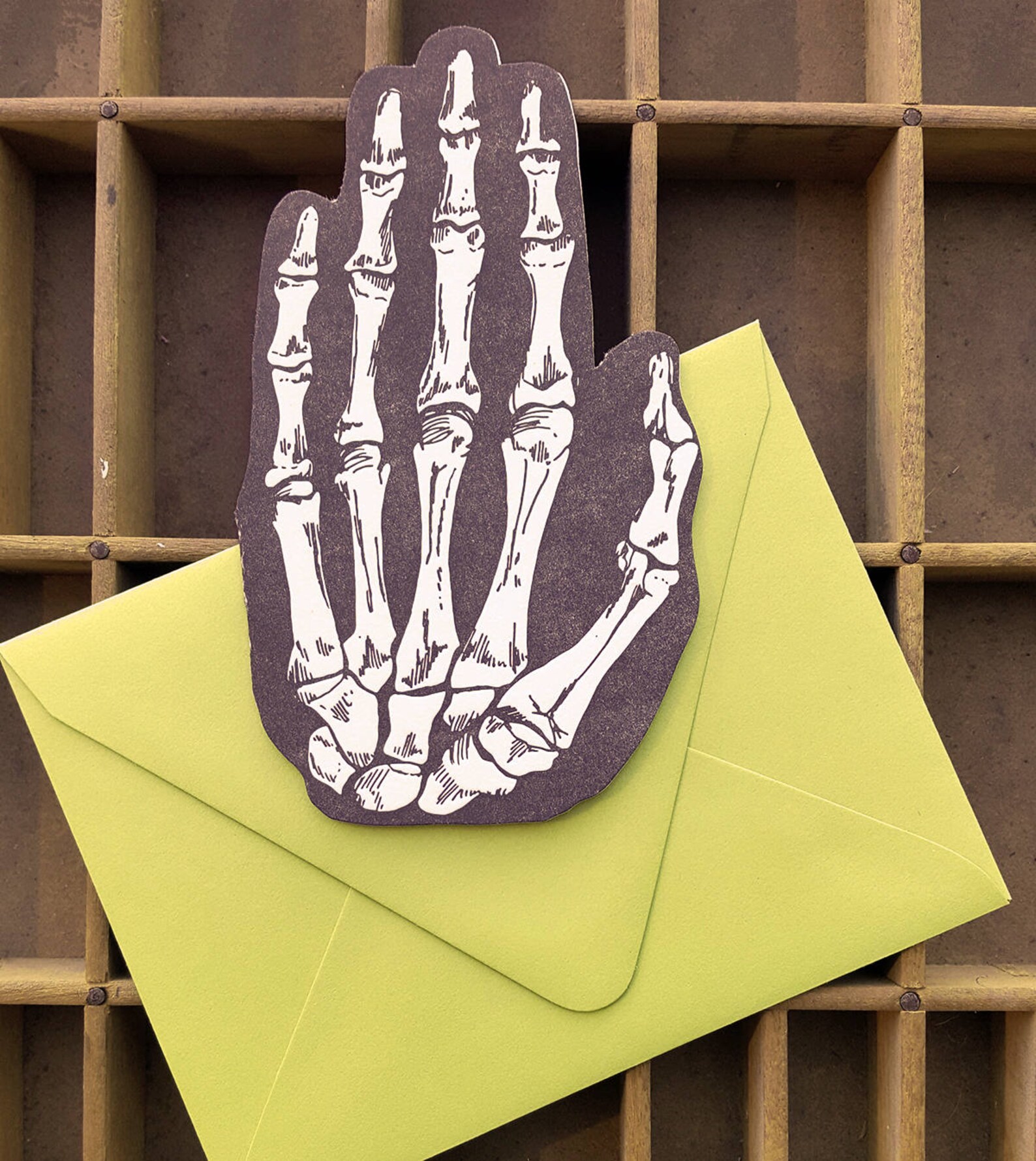 Letterpress skeleton hand shaped card | Etsy
