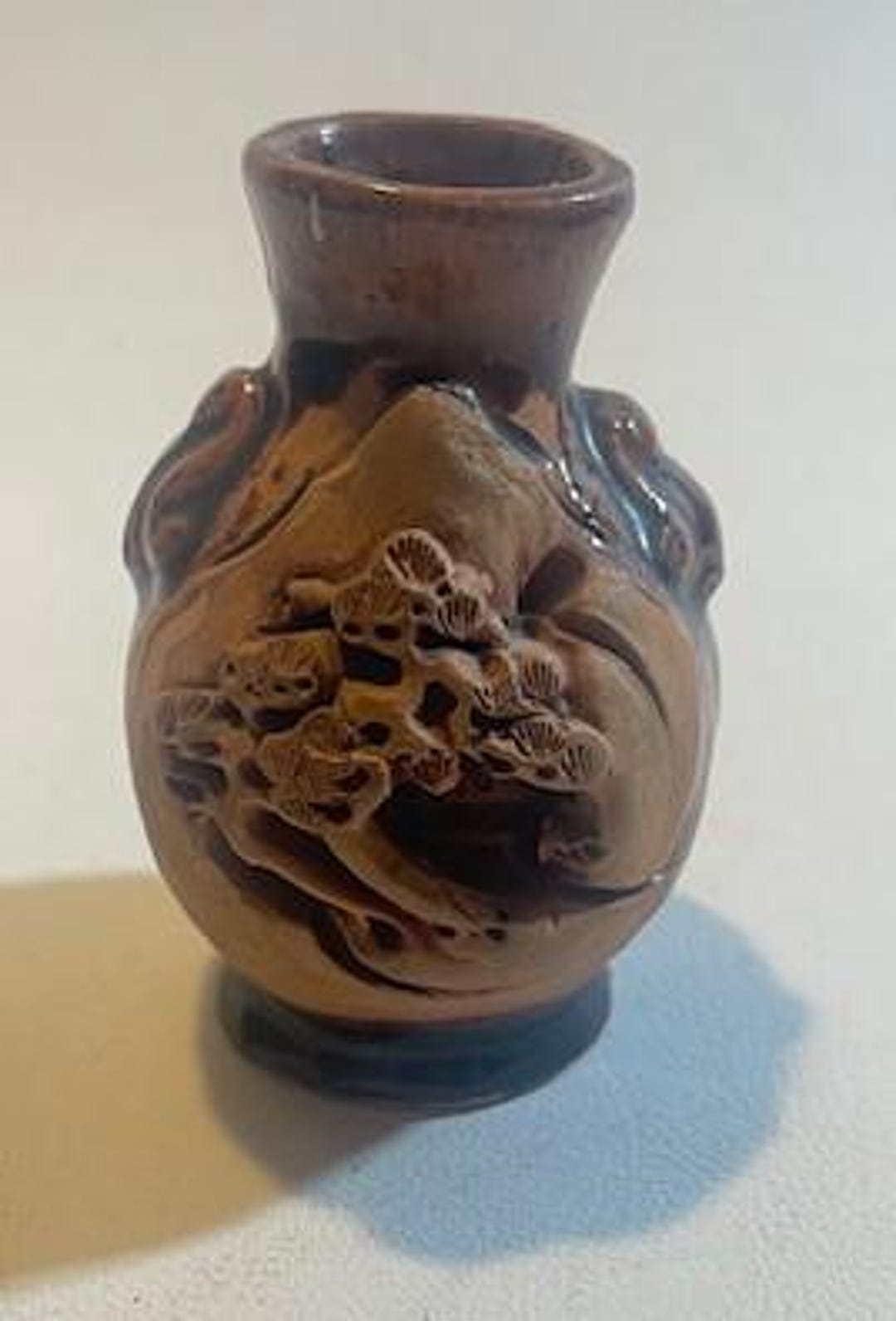 Carved Pottery Relic With Relief of Caves Banks Carved Relic ...