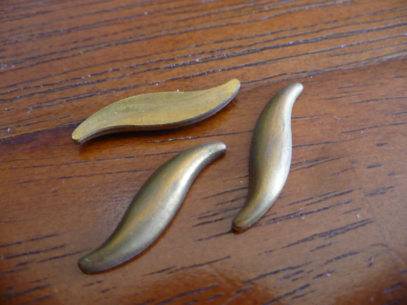 Vintage Die Cast Stampings, 1950s Small Curved Tilde Shape Raw Unplated ...