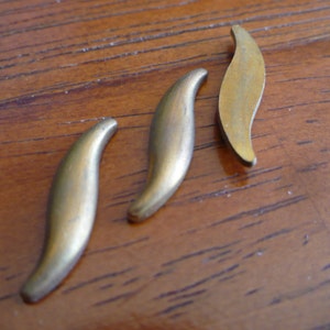 Vintage Die Cast Stampings, 1950s Small Curved Tilde Shape Raw Unplated ...