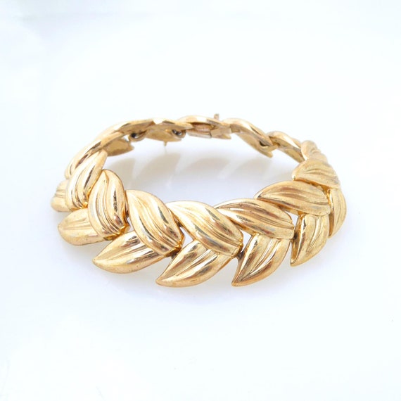 1960s Vintage Crown Trifari gold puffy leaf whale tai… - Gem