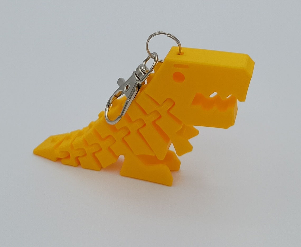 Introducing the Flexi Rex Keychain Toy: Fun On-the-go Entertainment - Etsy