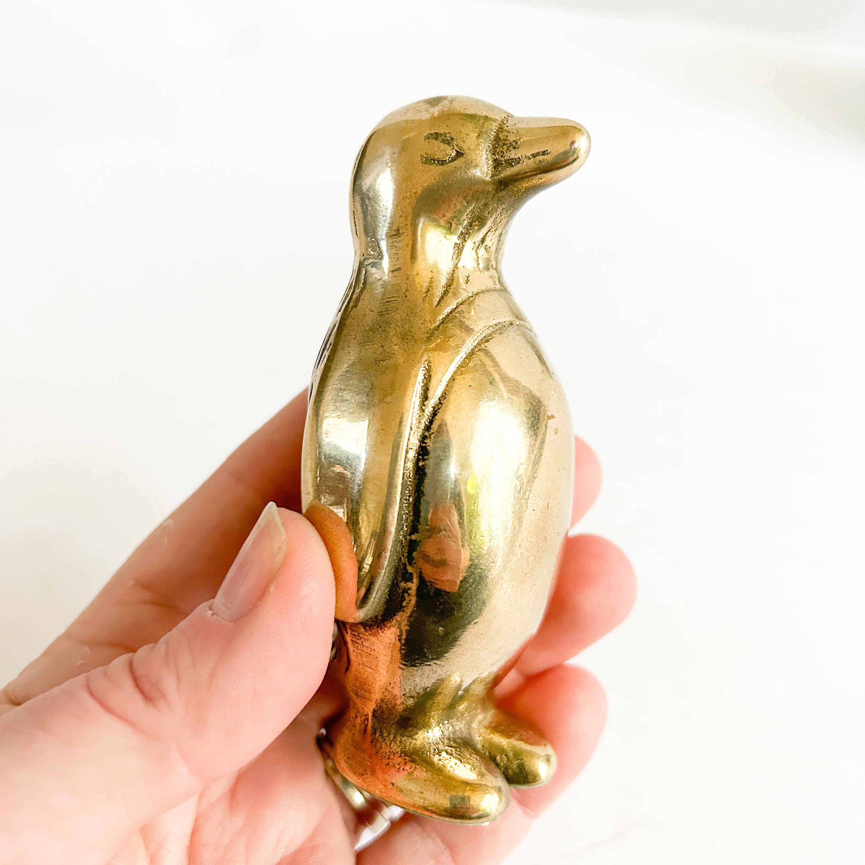 Penguin Butler Statue