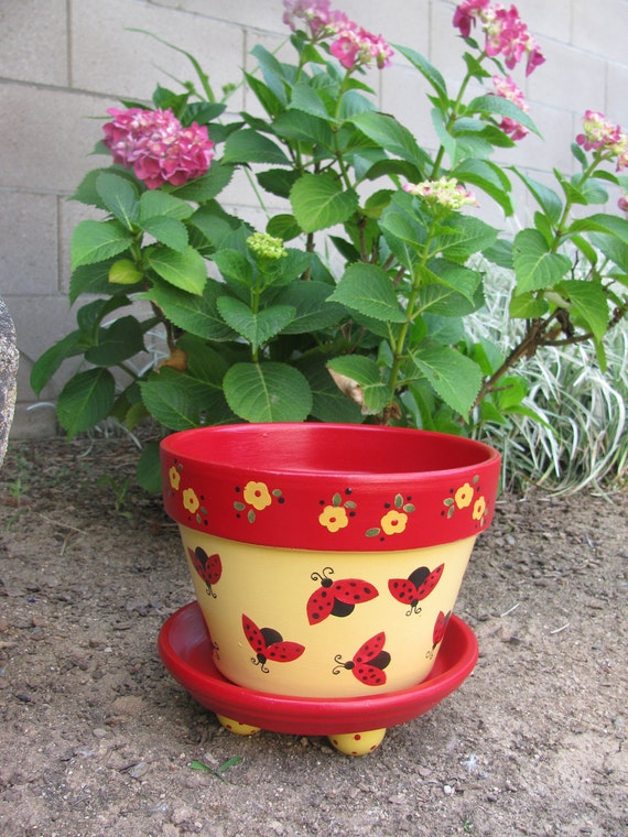 Planters & Pots Small porcelain ceramic planter on legs decorated with ...