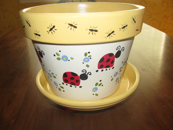 Planters & Pots Small porcelain ceramic planter on legs decorated with ...