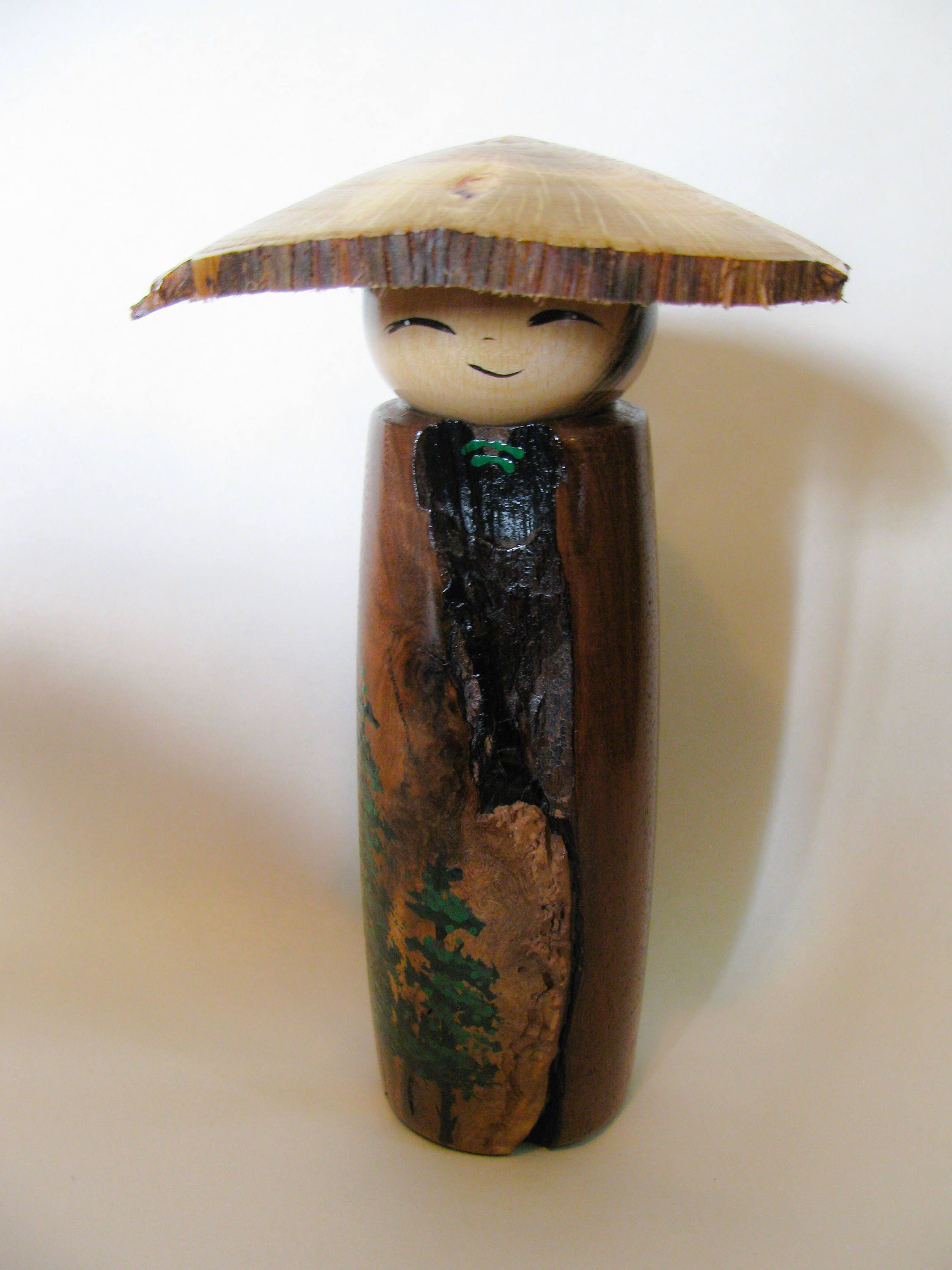 Pine trees on walnut with oak hat