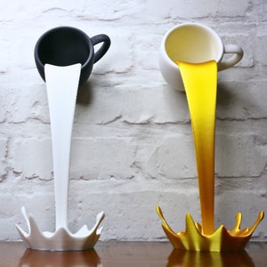 Gravity-defying Liquid Sculpture, Frozen in Time, a Cup Pouring Liquid ...