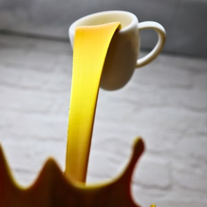 Gravity-defying Liquid Sculpture, Frozen in Time, a Cup Pouring Liquid ...