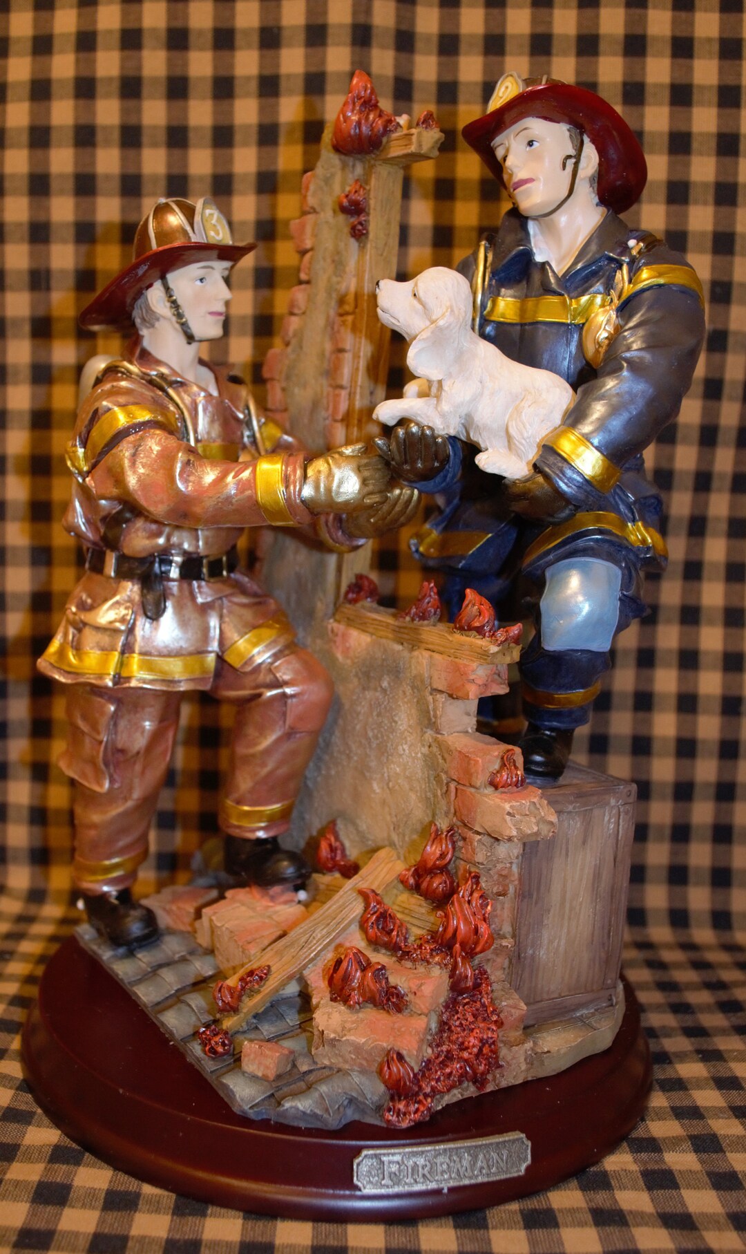 Beautifully Detailed Statue of a Firefighter Handing a Puppy Out of a ...