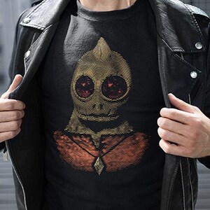 Land of the Lost Shirts Enik the Altrusian Sleestak Tee Shirt ...