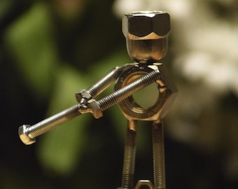 Handcrafted Metal Sculpture of A Person Skateboarding Made Using Nuts ...