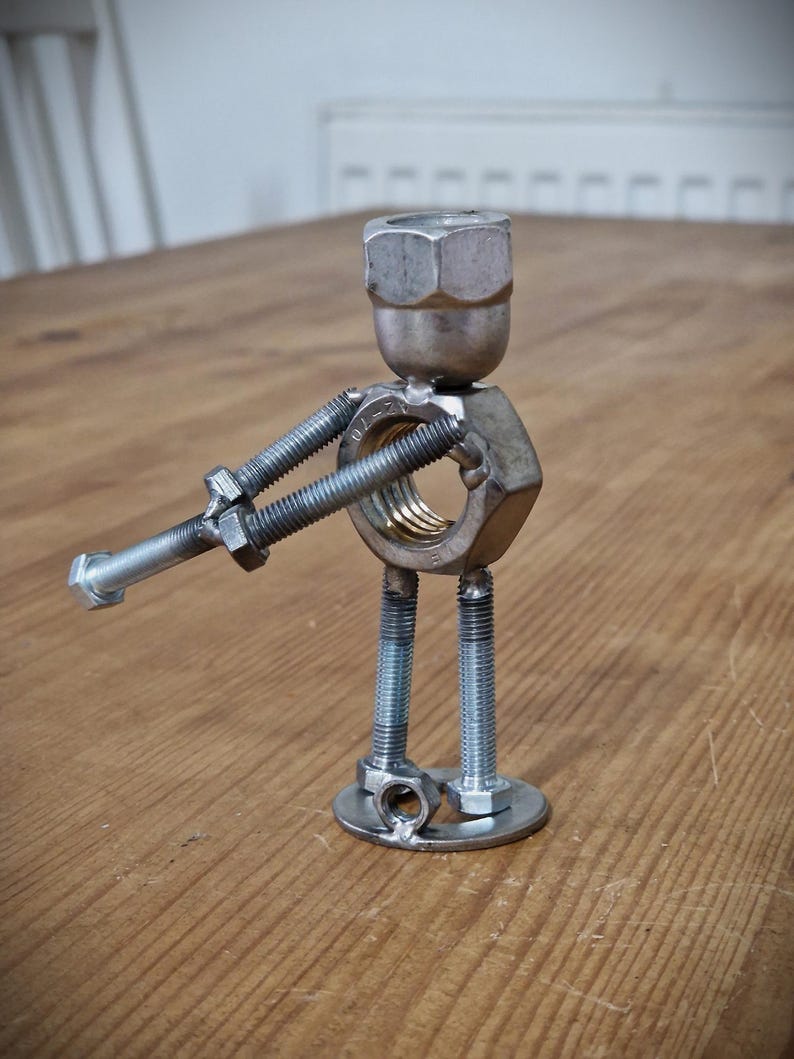 Handcrafted Metal Sculpture of A Person Playing Golf Made Using Nuts ...