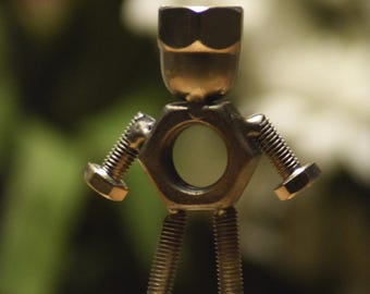 Unique Metal Sculpture of A Person Reading on the Toilet Made Using ...