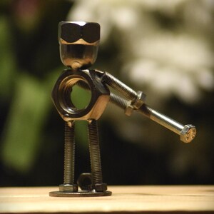 Handcrafted Metal Sculpture of A Person Playing Golf Made Using Nuts ...