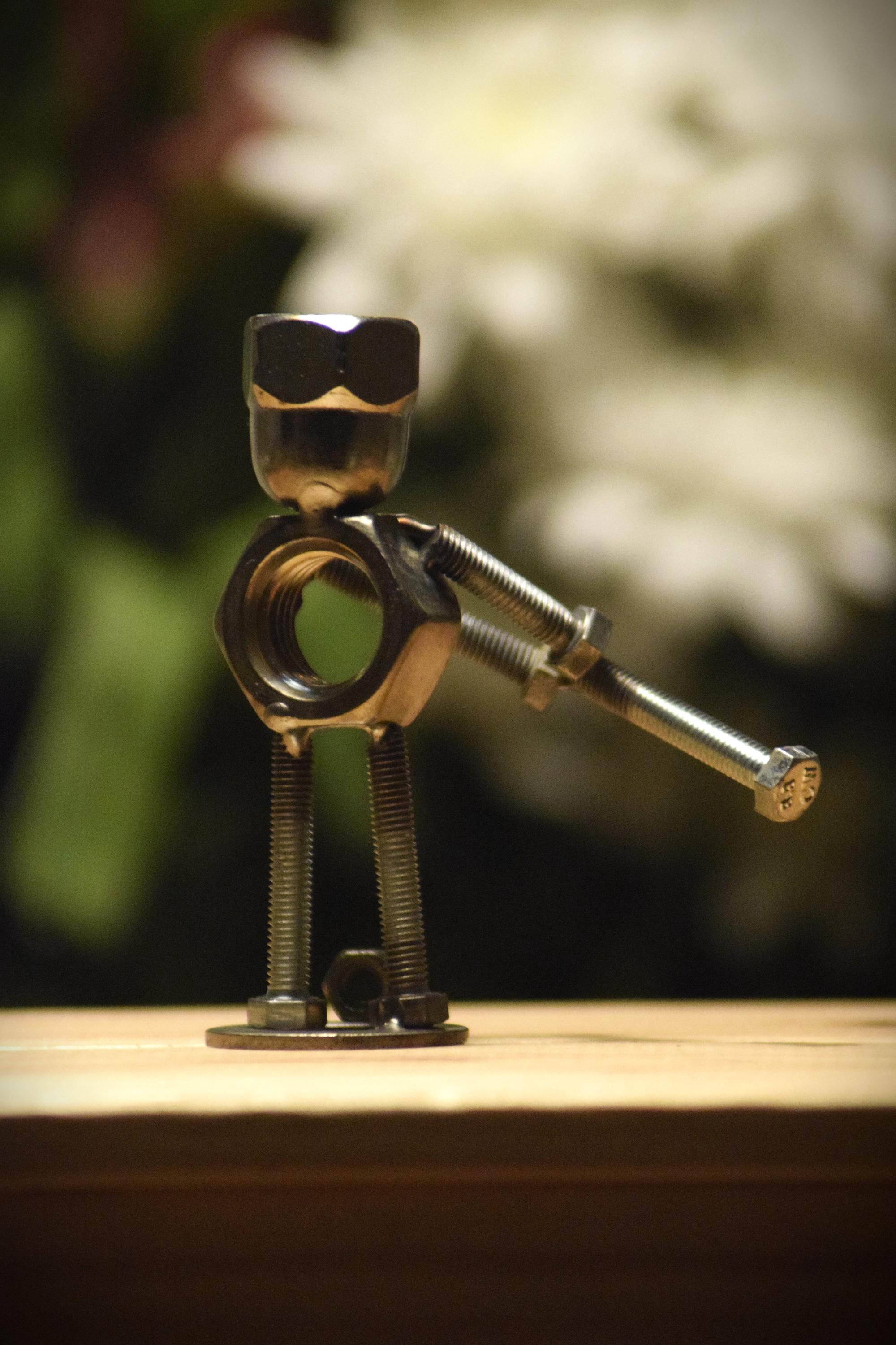 Handcrafted Metal Sculpture of A Person Playing Golf Made Using Nuts ...