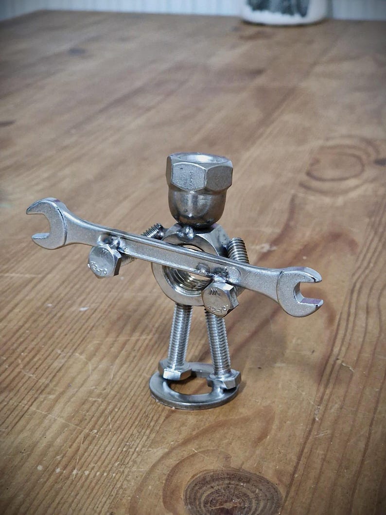 Handmade Metal Sculpture of A Mechanic Made Using Nuts, Bolts and ...