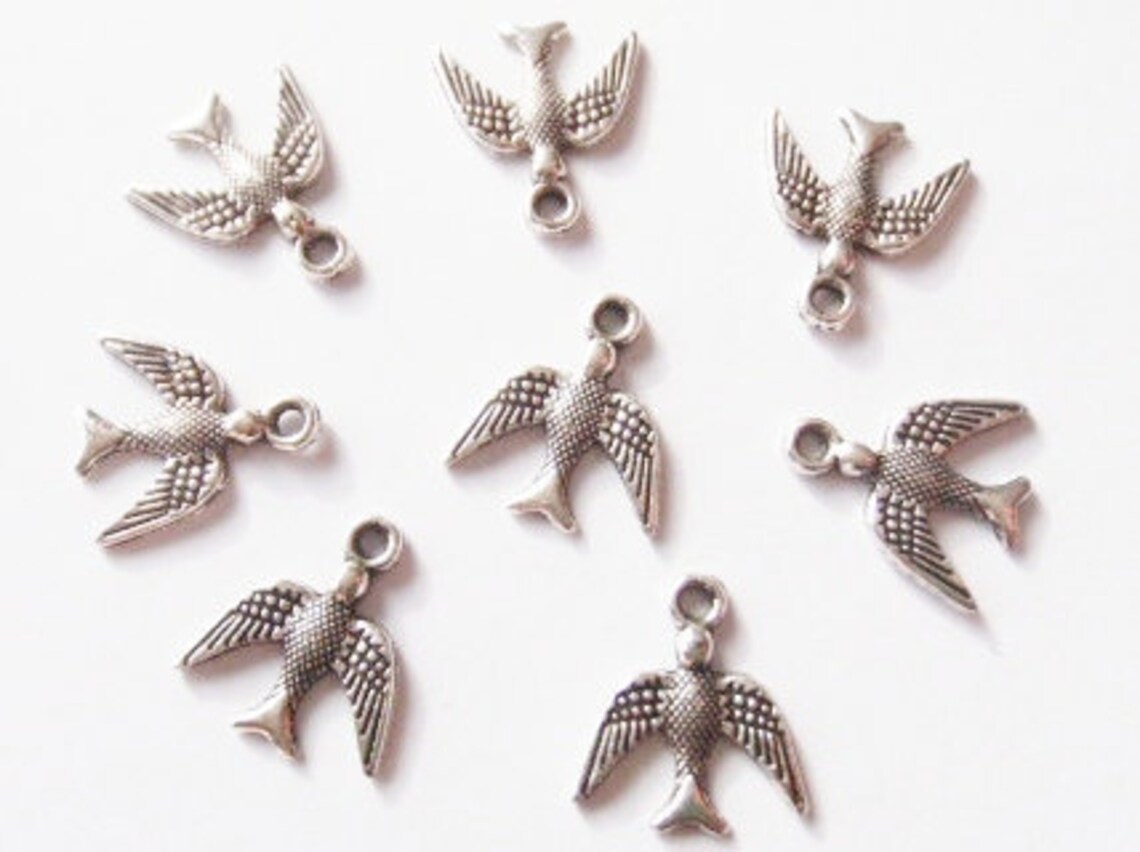 10 Bird Charms 16x15mm ITEM:AB24 - Etsy
