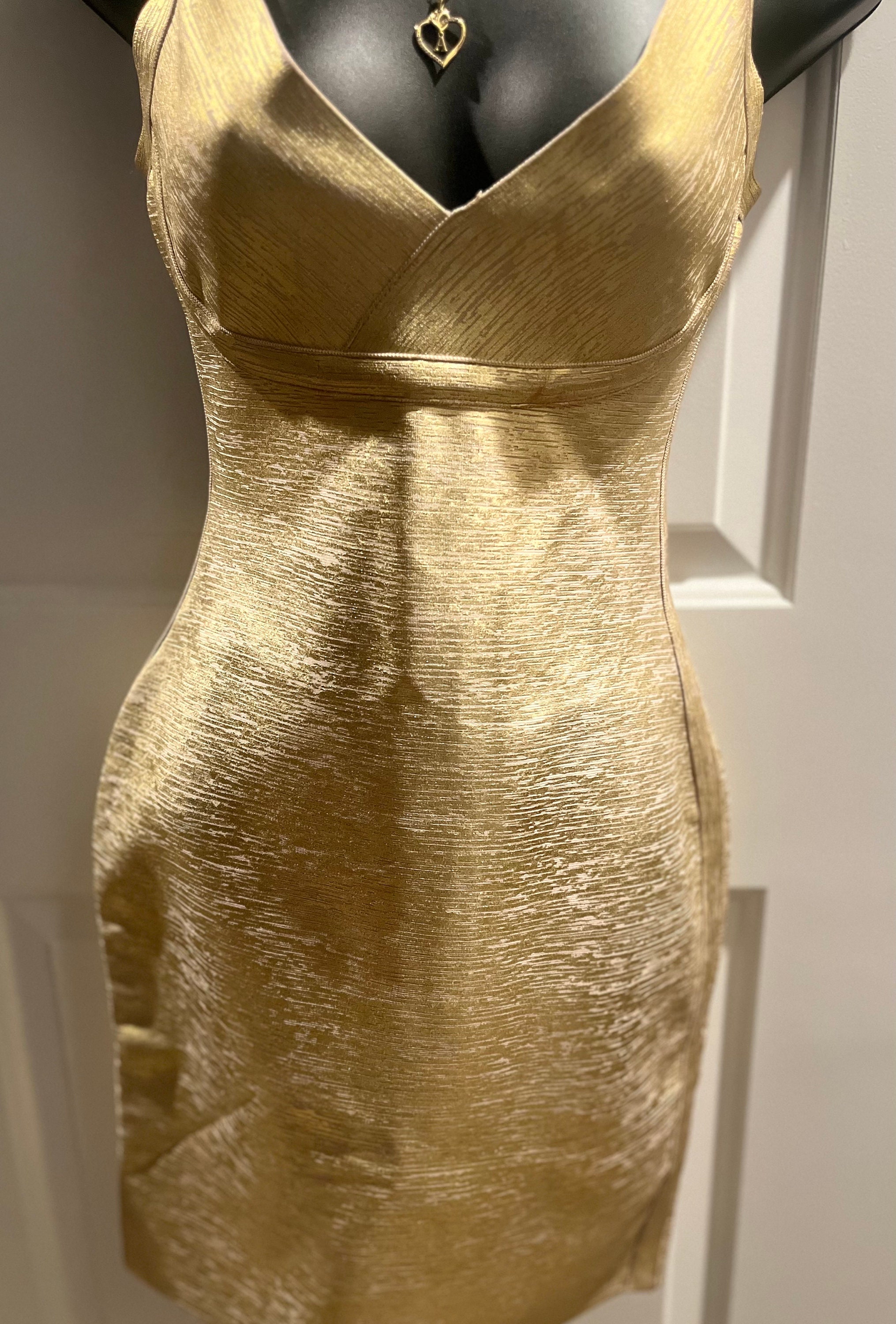 Shine Like Gold.emphasize the Dresssluxurious Gold Color and Its ...