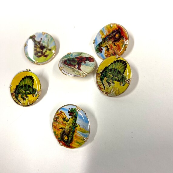 6 Vintage Tin Lithograph Prehistoric Dinosaur Pins - Gem