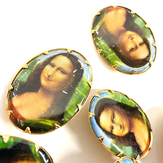 12 Vintage Tin Lithograph Mona Lisa Pins - Gem