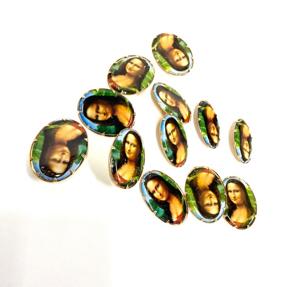 12 Vintage Tin Lithograph Mona Lisa Pins - Gem