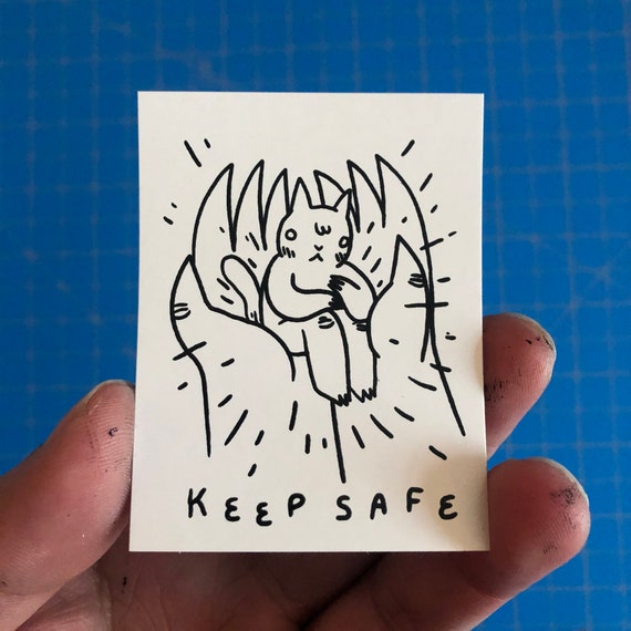 Keep Safe Cat in Hand Vinyl Sticker by Deth P. Sun | Etsy