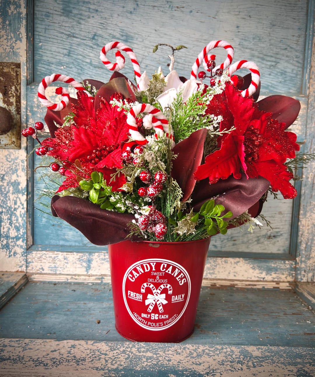 Candy Cane Bucket Christmas Centerpiece: Poinsettia & Magnolia Floral ...