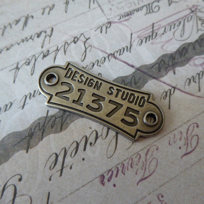 Design Studio 21375 Industrial Number Metal Plaque | Etsy