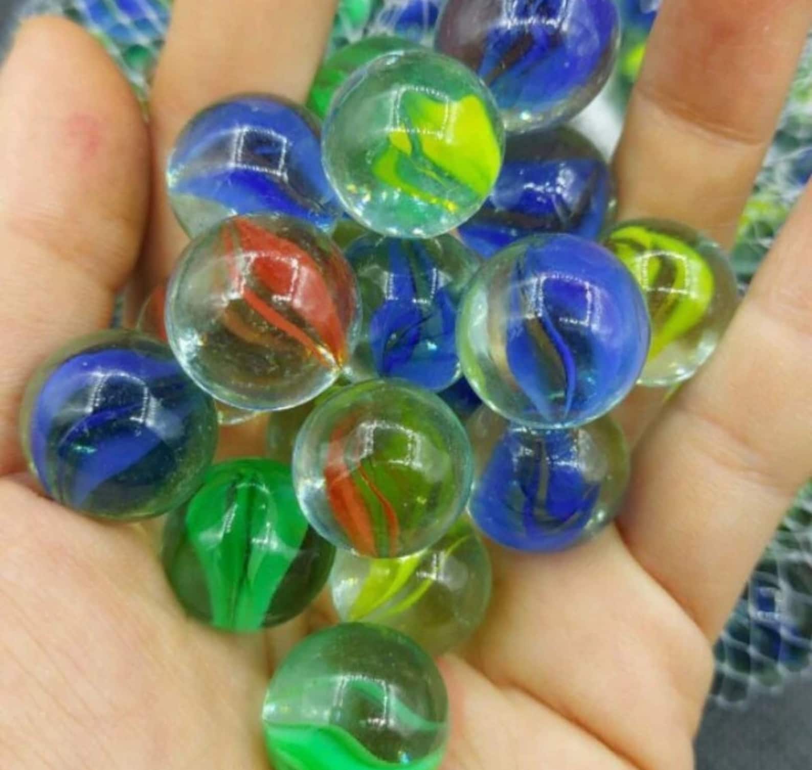 A Glass Marble is a Small, Spherical Toy Typically Made From Glass ...