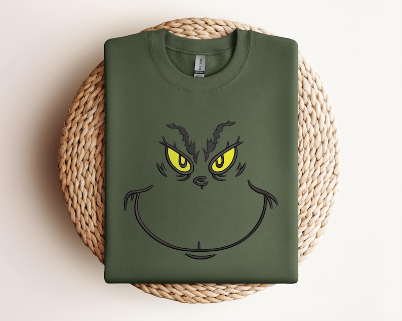 Felpa girocollo con il volto del Grinch ricamato Gildan per le feste ...