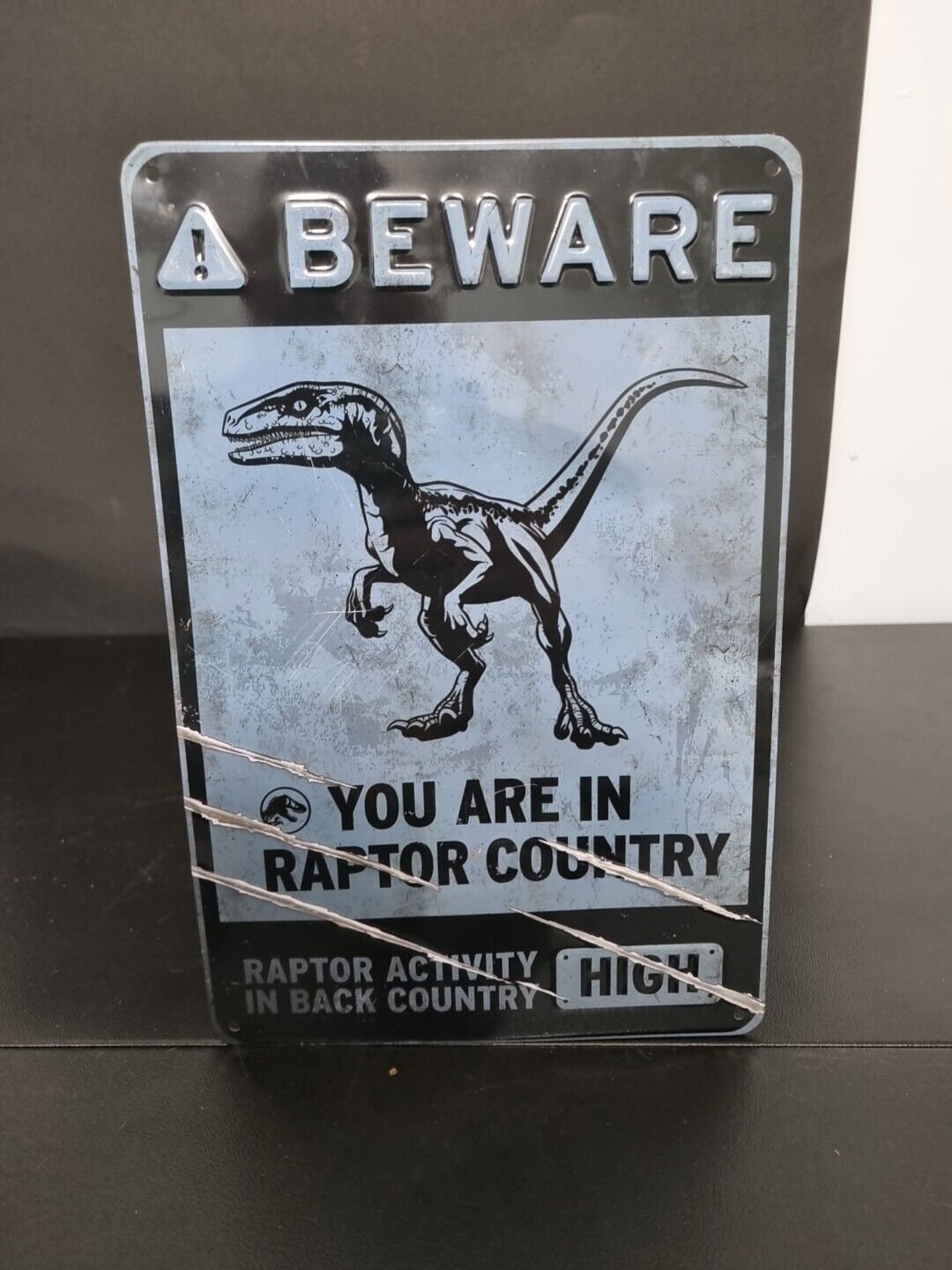 Jurassic World Velociraptor Blue Raptor Beware Dinosaur Metal Sign ...