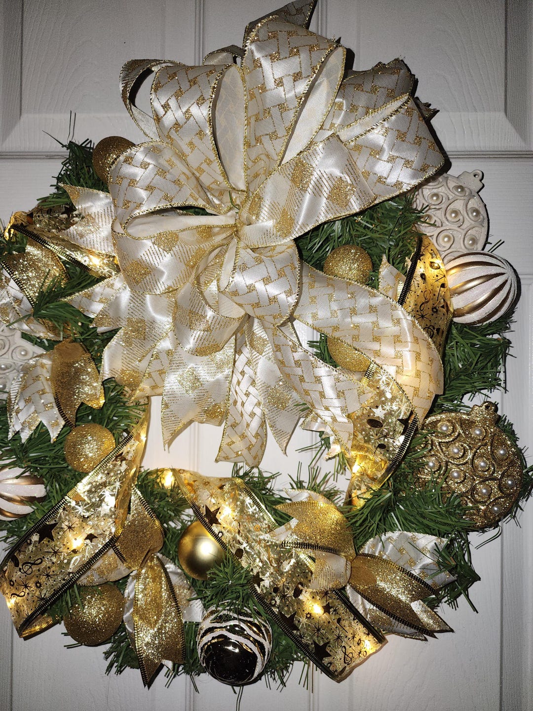 Beautiful Lit White and Gold Wreath With a Large White Satin and Gold ...