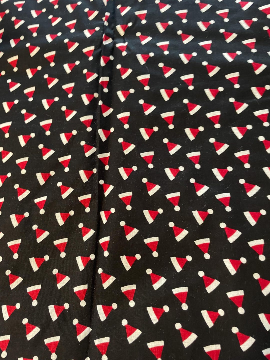 Cotton Fabric Repeating Pattern of Classic Red and White Santa Hats ...