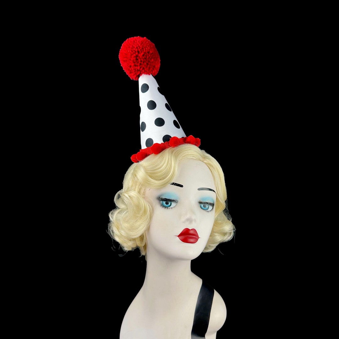 Mini Clown Hat With Black and White Polka Dots and Red Pom Pom on a ...