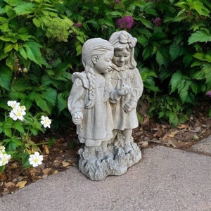 Standing Two Girls With Butterfly Statue, Backyard Cement Two Kids ...