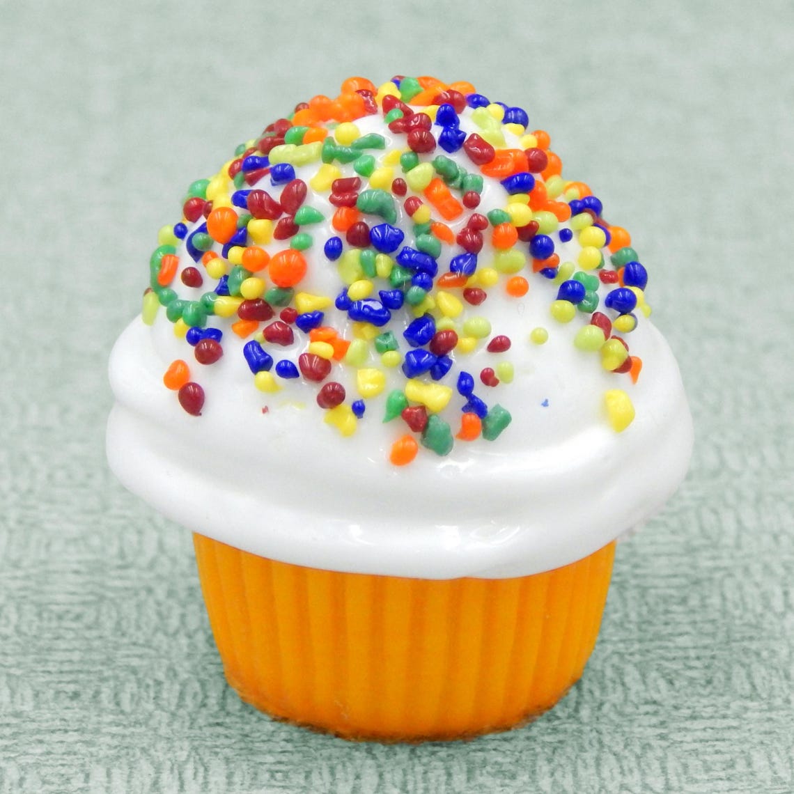 27-203gcx Bright Sprinkles Mini Cupcake Truffle on a Mango Color Base ...