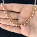 Dancing Pearl Necklace / Natural White Seed Pearls / Coppery Swarovski ...
