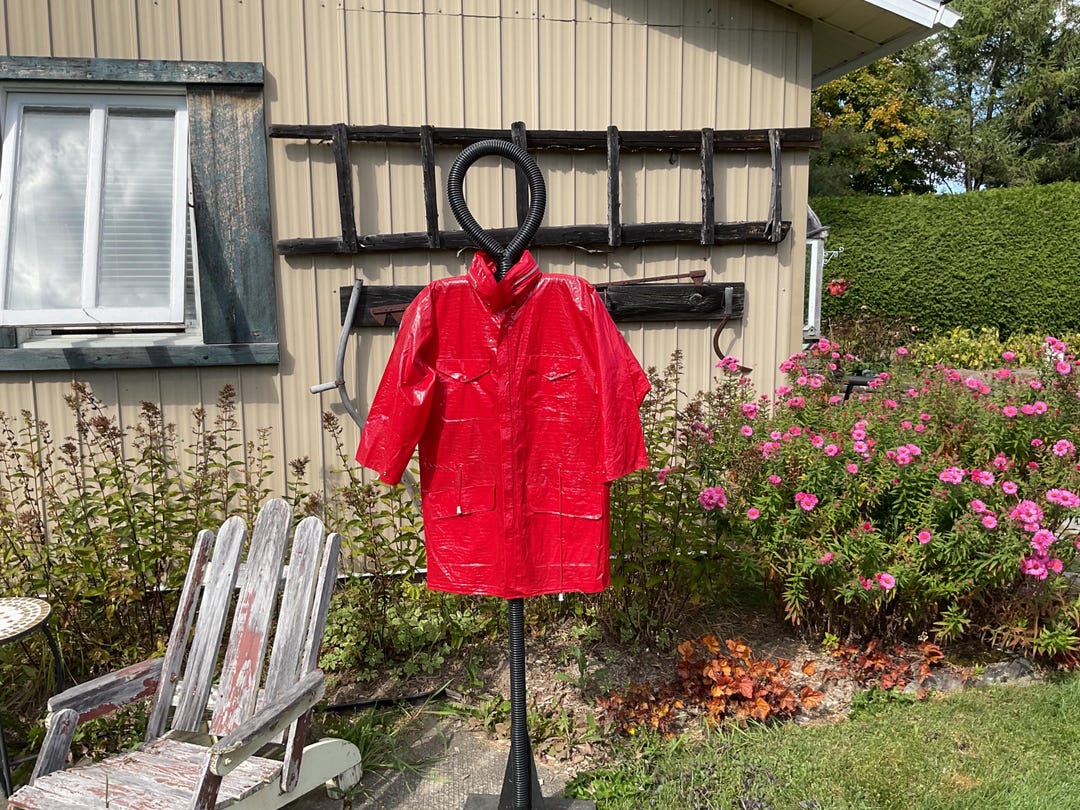 Red Pvc Raincoat With Retractable Hood. Zipper, Drawstring, Patch ...
