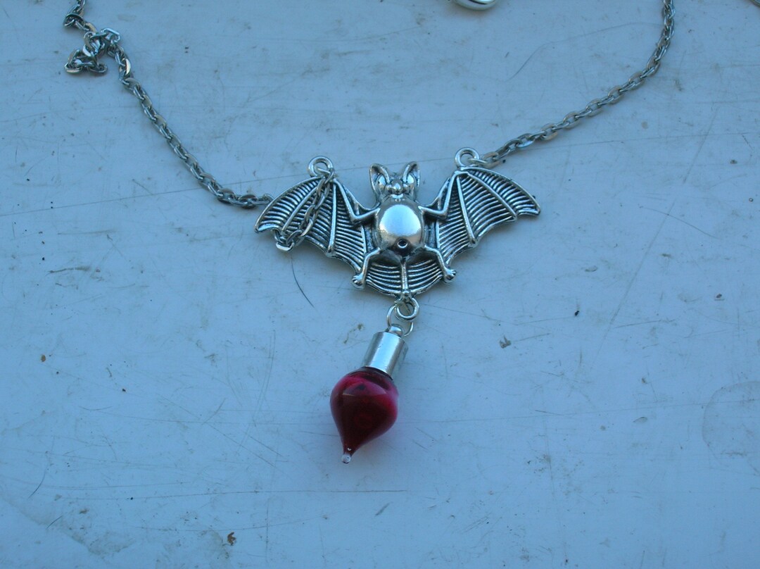 Macabre Gothic Vampire Bat and Vial of Blood Pendant. Also - Etsy