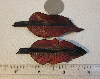 Leather feathers | Etsy