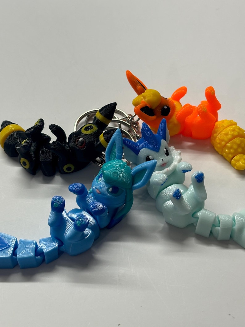 3D Printed Flexy Eevee Eevolution – Articulated Pokémon Toy | Eevee ...