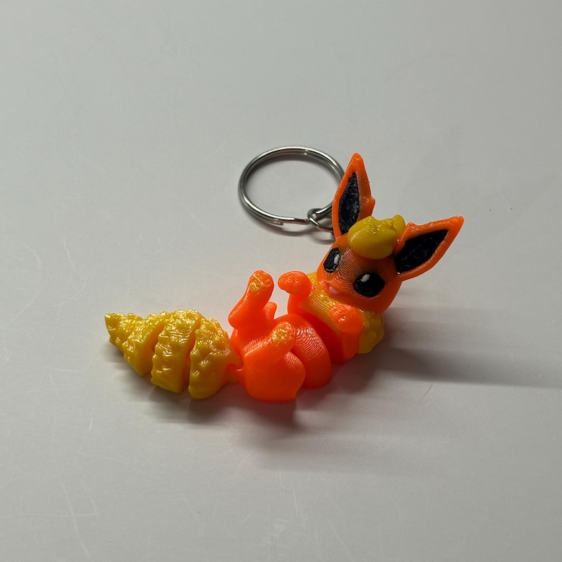 3D Printed Flexy Eevee Eevolution – Articulated Pokémon Toy | Eevee ...
