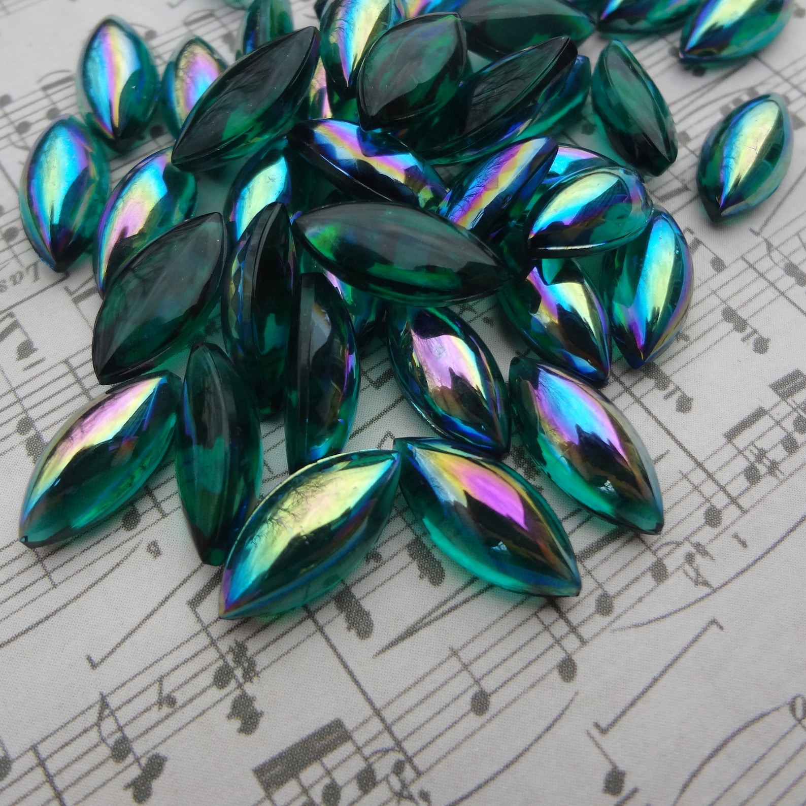 15x7mm Emerald Green Fire Polished AB Slightly Rounded Flat Back Un ...