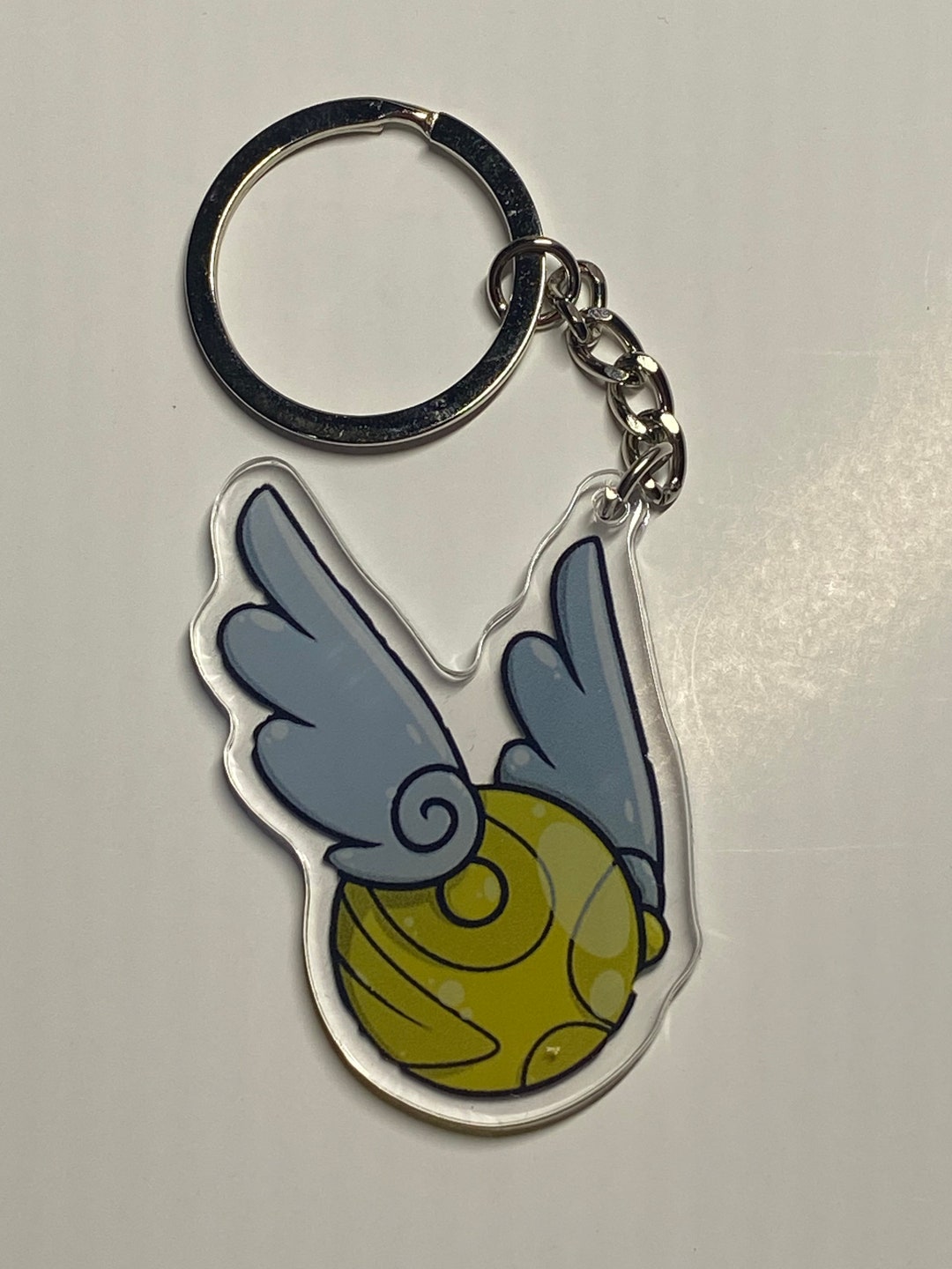 The Golden Snitch Acrylic Keychain - Etsy