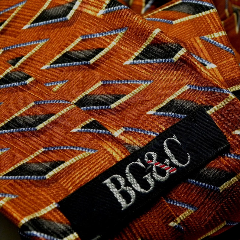 1980s BG&C Silk Necktie: Geometric Diamond Jacquard, Copper Rust Blue ...