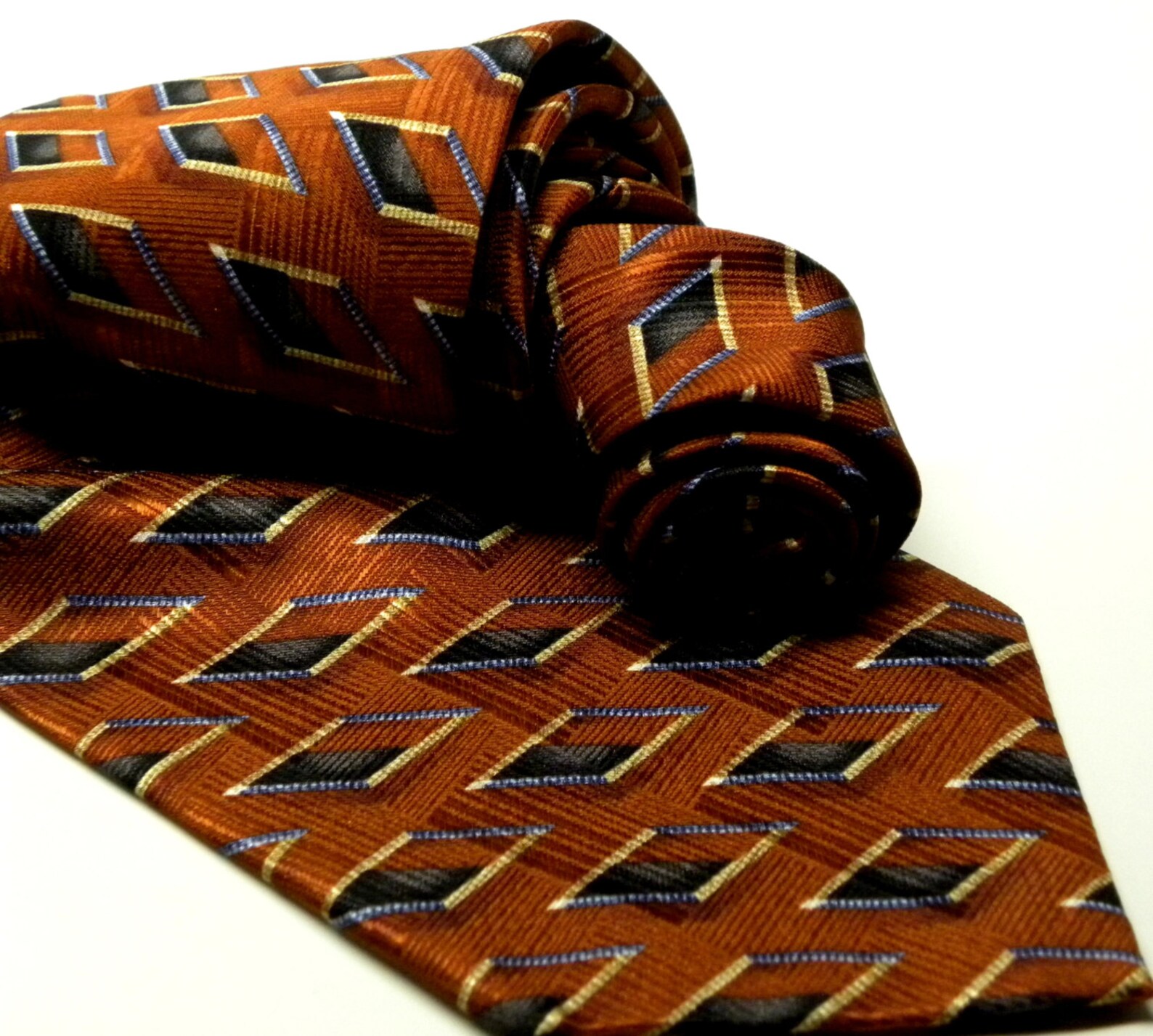 1980s BG&C Silk Necktie: Geometric Diamond Jacquard, Copper Rust Blue ...