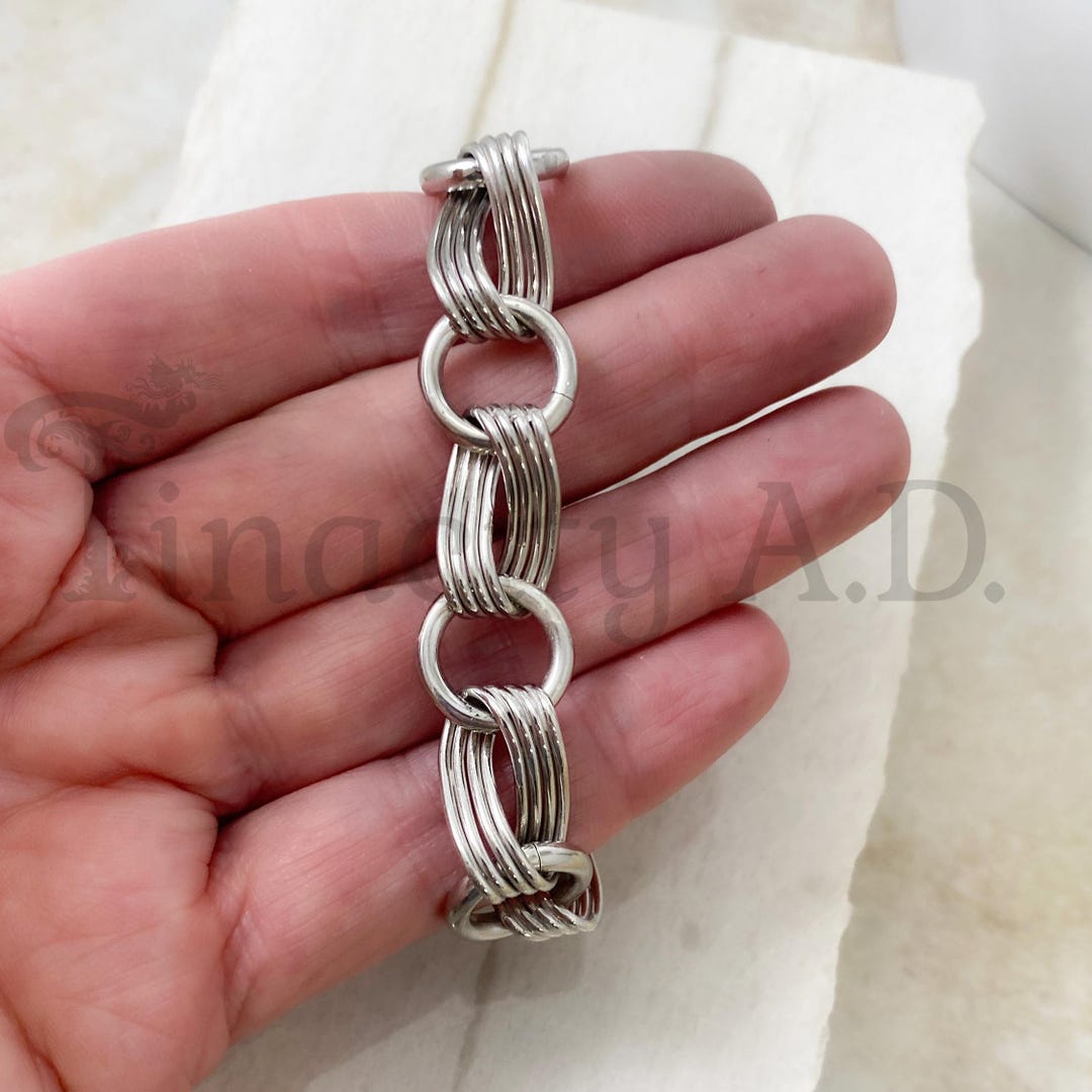 A Vintage Sleek and Stylized Sterling Silver Binder Brothers Link ...